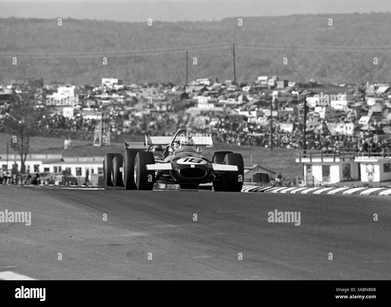 Piers Courage(GBR) Brabham BT26A leads John Surtees(GBR) BRM P139. They ...