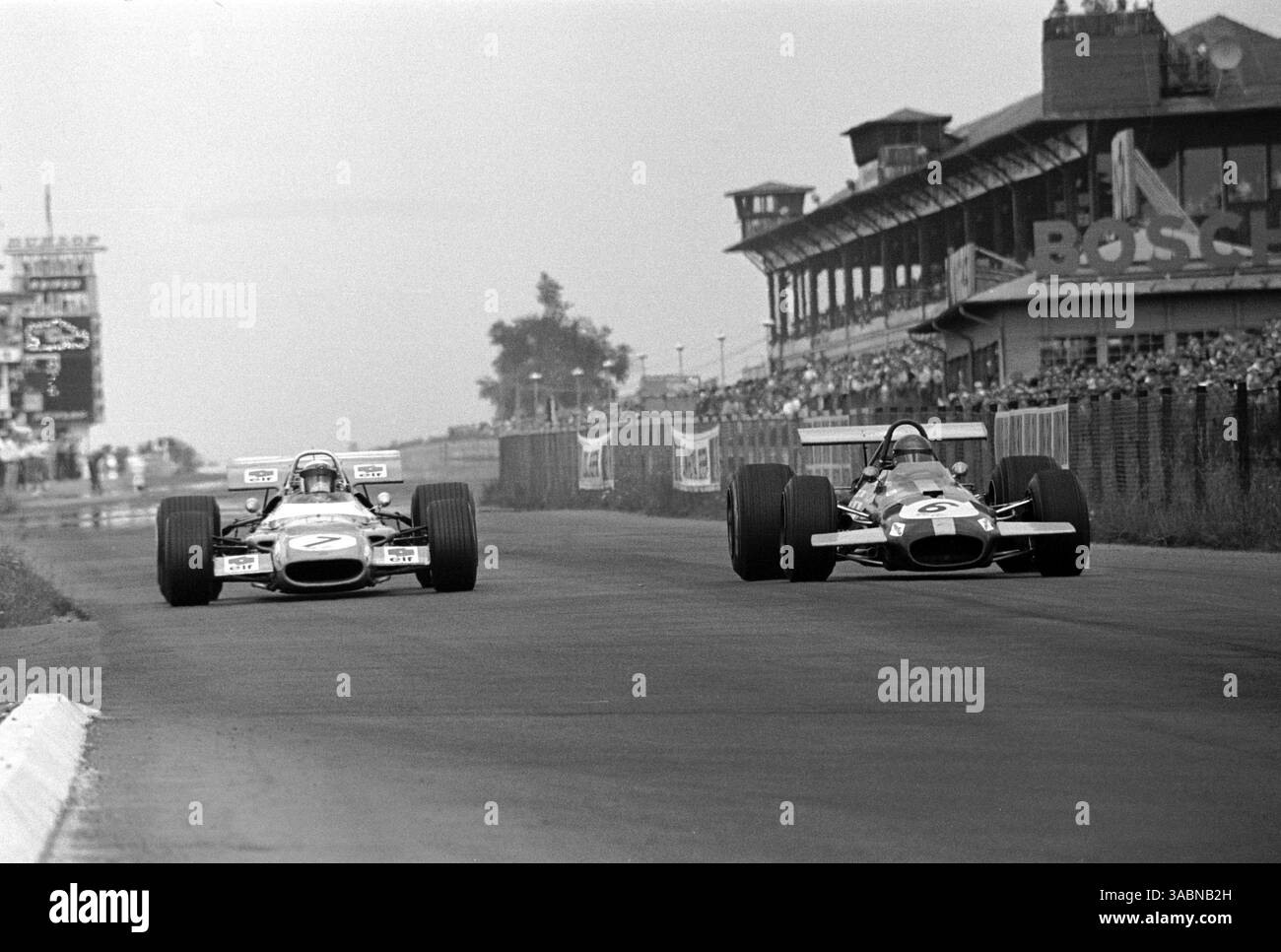 Winner Jacky Ickx(BEL) Brabham BT26A takes the lead from Jackie Stewart(GBR) Matra MS80 after a ...