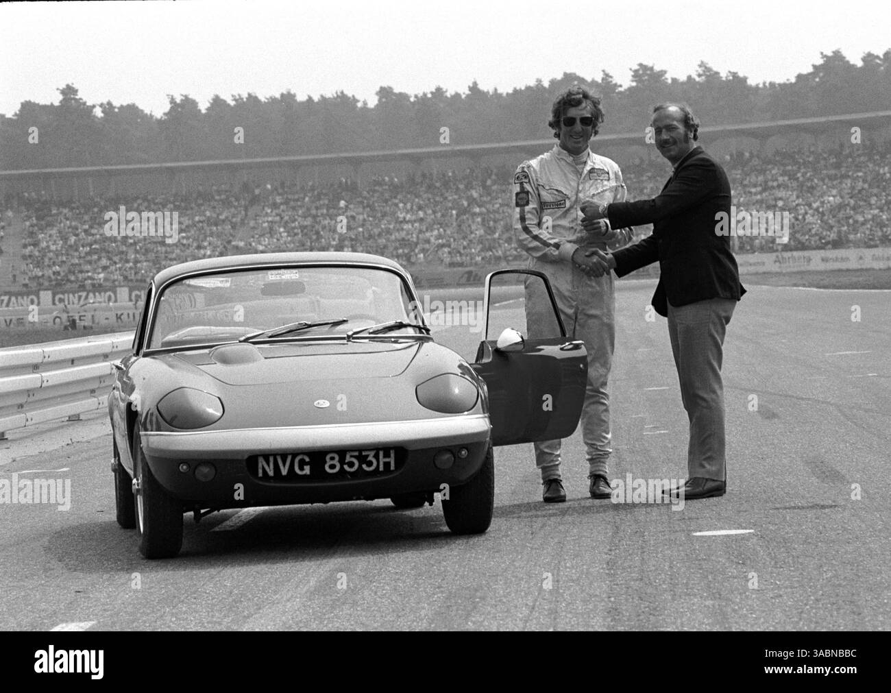 Jochen Rindt(AUT), left takes delivery of his Lotus Elan from Lotus ...