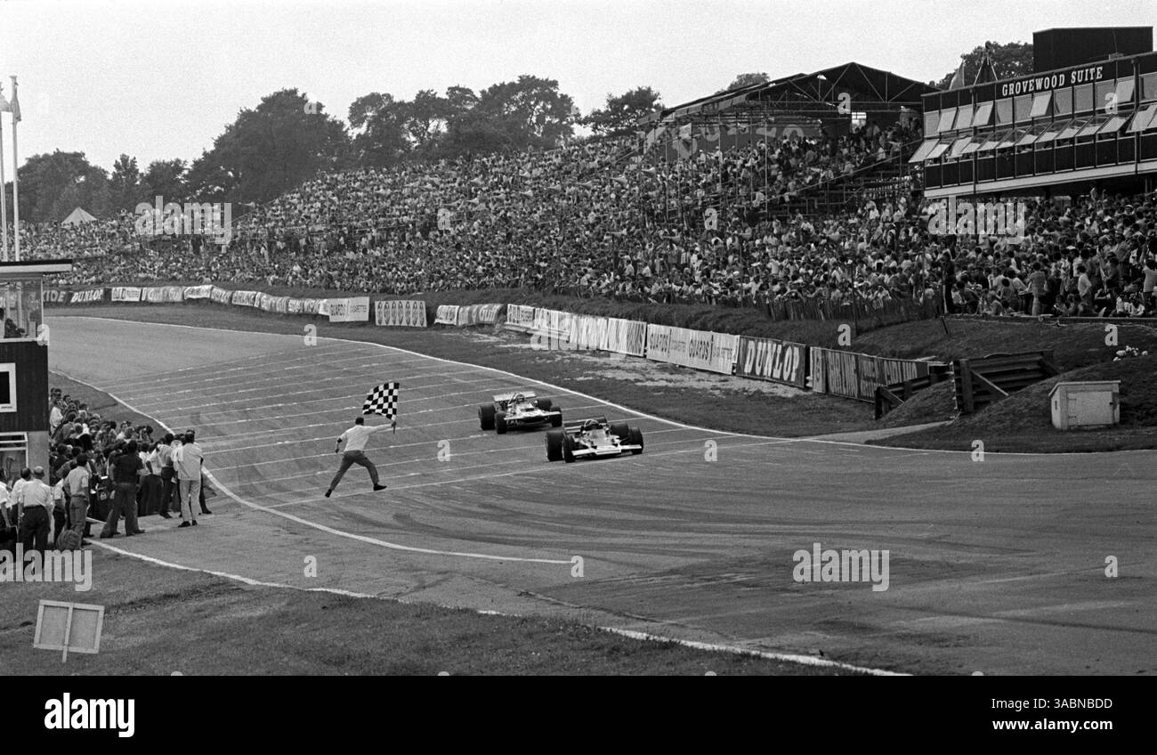 Jochen Rindt(AUT) takes the flag in his Lotus 72C to win his 3rd Grand ...