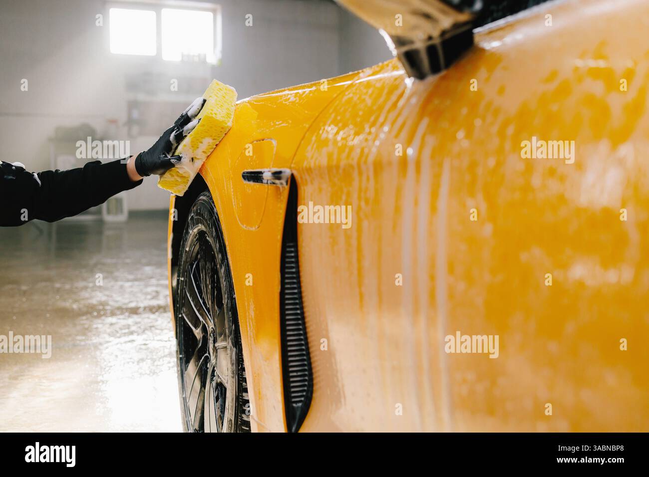 Procedure of washing car with soap solution and detergent before auto ...