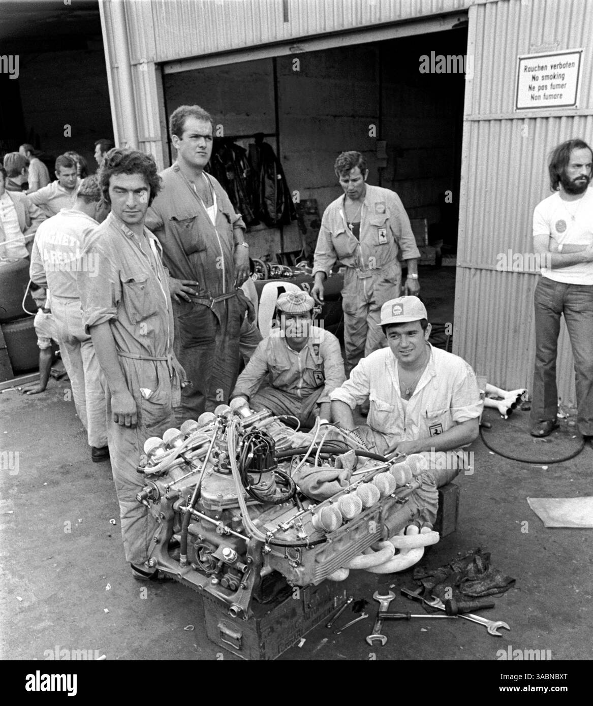 Ferrari mechanics with Ferrari Flat 12 engine in the paddock..German GP ...