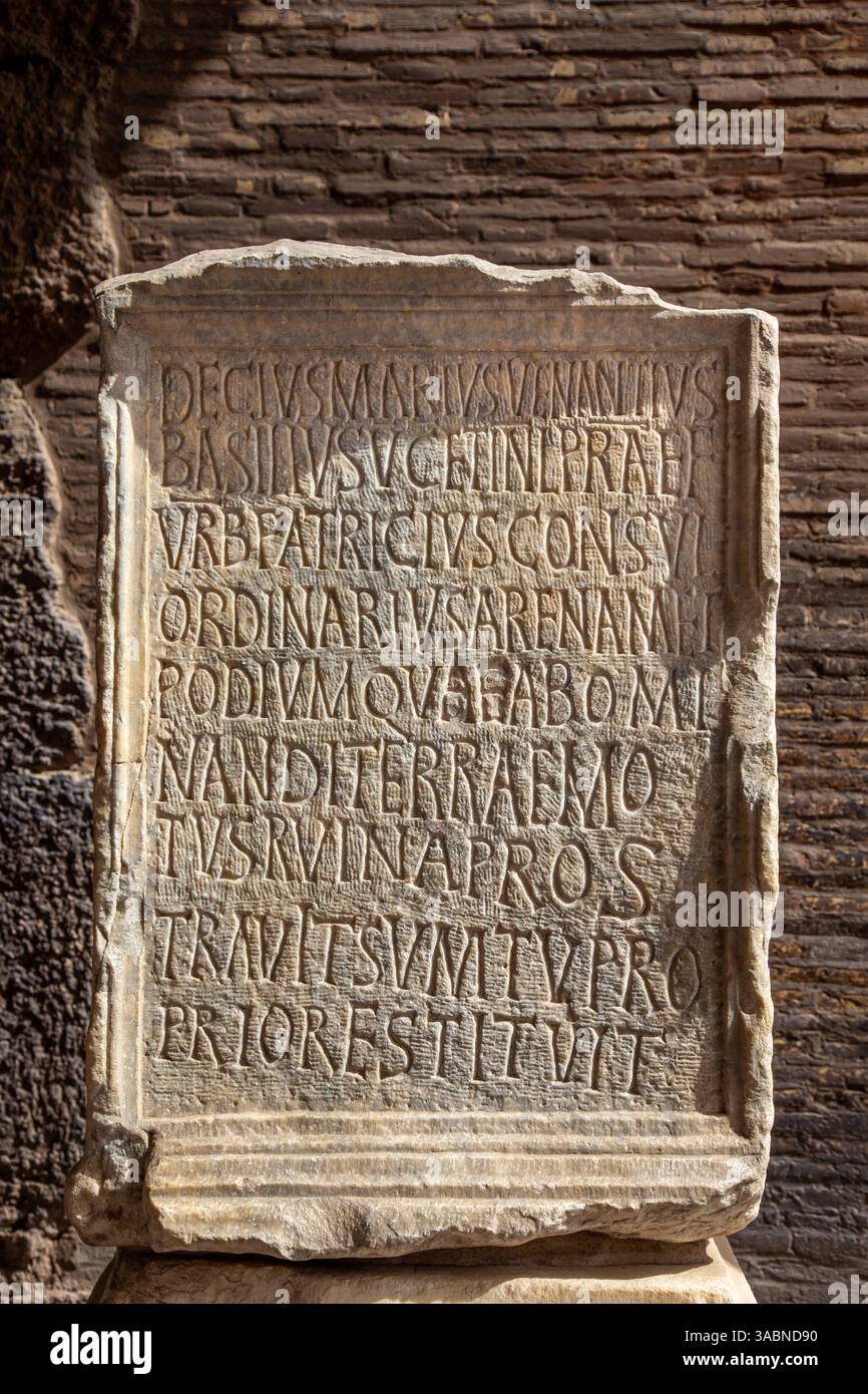 Latin Roman writing at the Colosseum amphitheatre in Rome Stock Photo ...