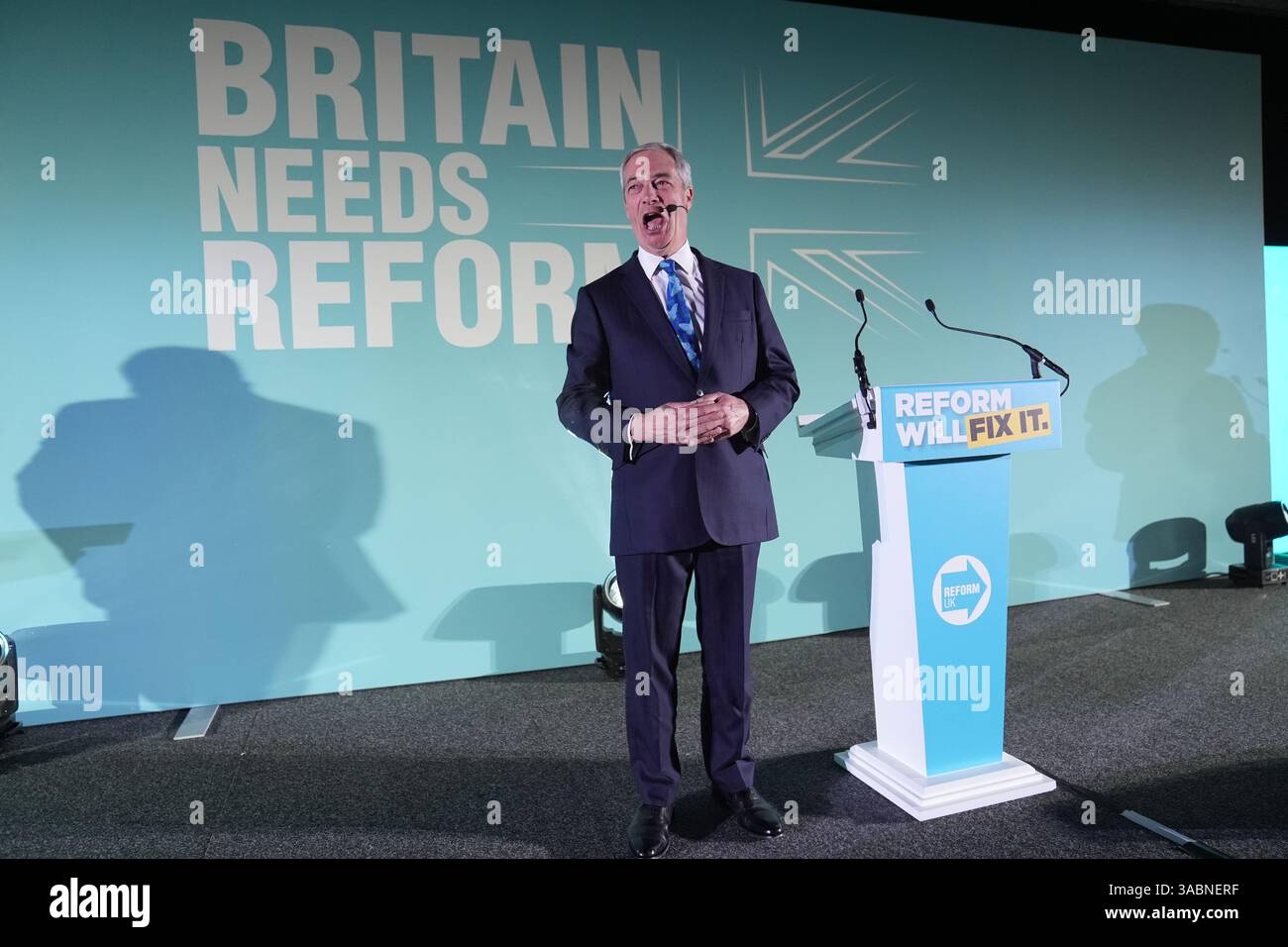 Reform UK leader Nigel Farage speaking at Kettering Leisure Village, in ...