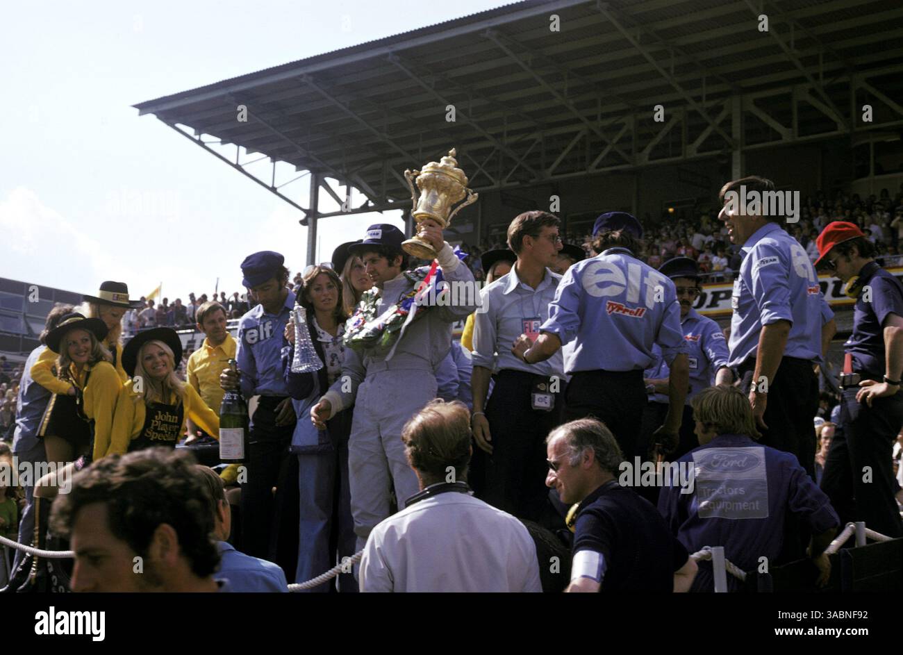 Jody Scheckter (RSA) Tyrrell 007 celebrates victory on the JPS mobile ...