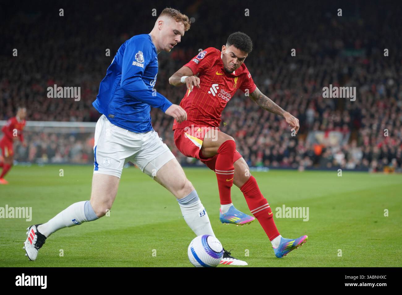 Liverpool's Luis Diaz, right, challenges Everton's Jarrad Branthwaite ...