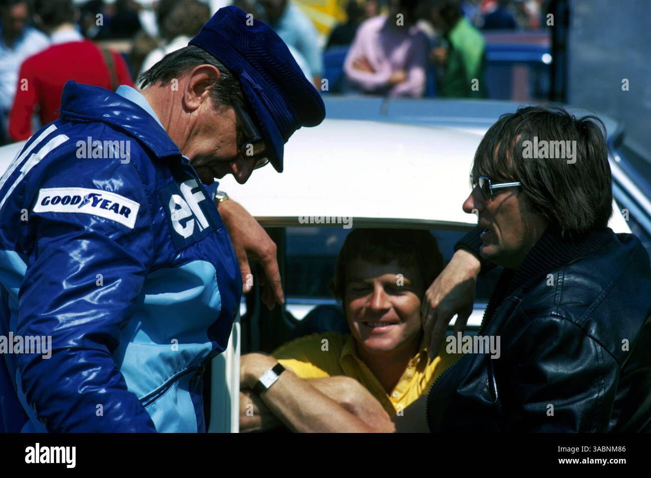 L to R): Ken Tyrrell (GBR) Tyrrell Team Owner talks with Max Mosley ...