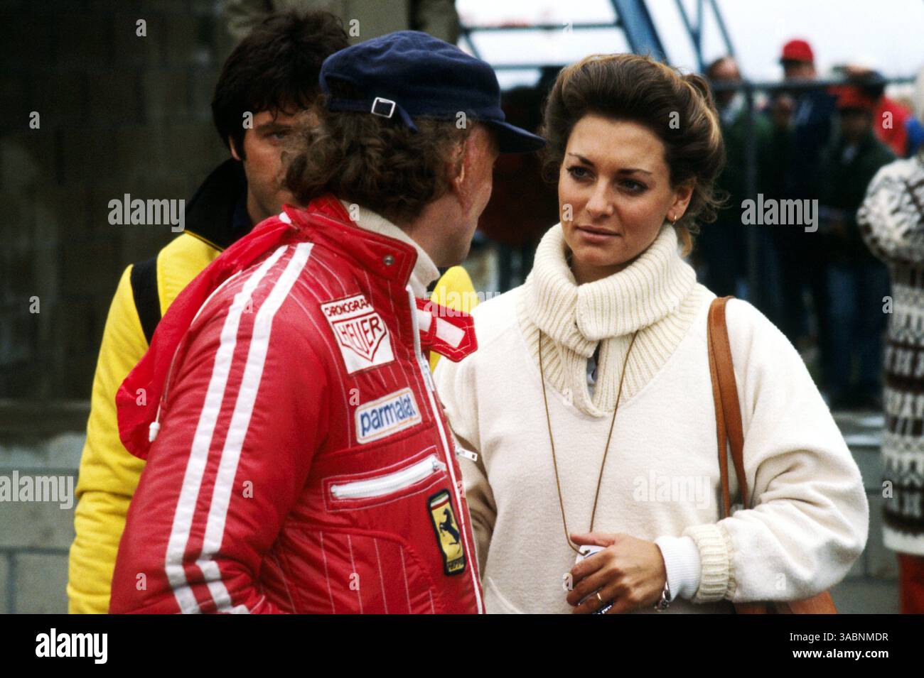 L to R): Niki Lauda (AUT) Ferrari talks with his wife Marlene Lauda ...