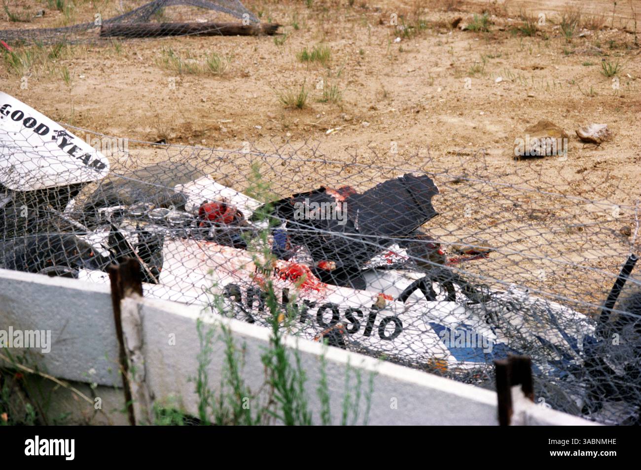 The bloodied Shadow DN8 of Tom Pryce (GBR) (Right) sits at Crowthorne ...