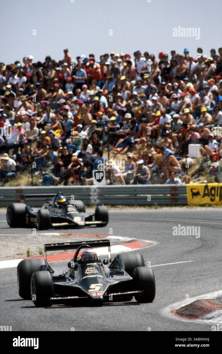 Race winner Mario Andretti (USA) Lotus 79 leads his second placed team ...