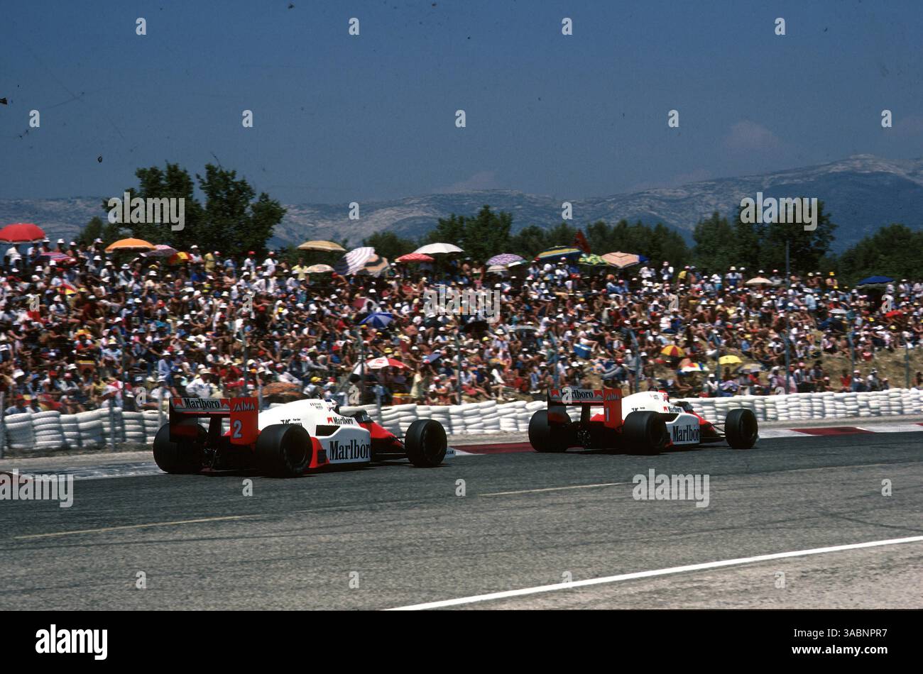 Alain Prost (FRA) McLaren MP4/2B, 3rd place, leads tem-mate Niki Lauda ...