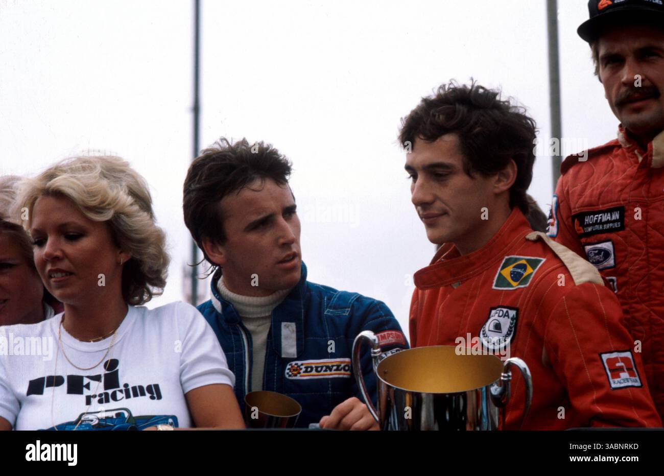 Race winner Ayrton Senna (BRA) Rushen Green Racing (centre) receives ...