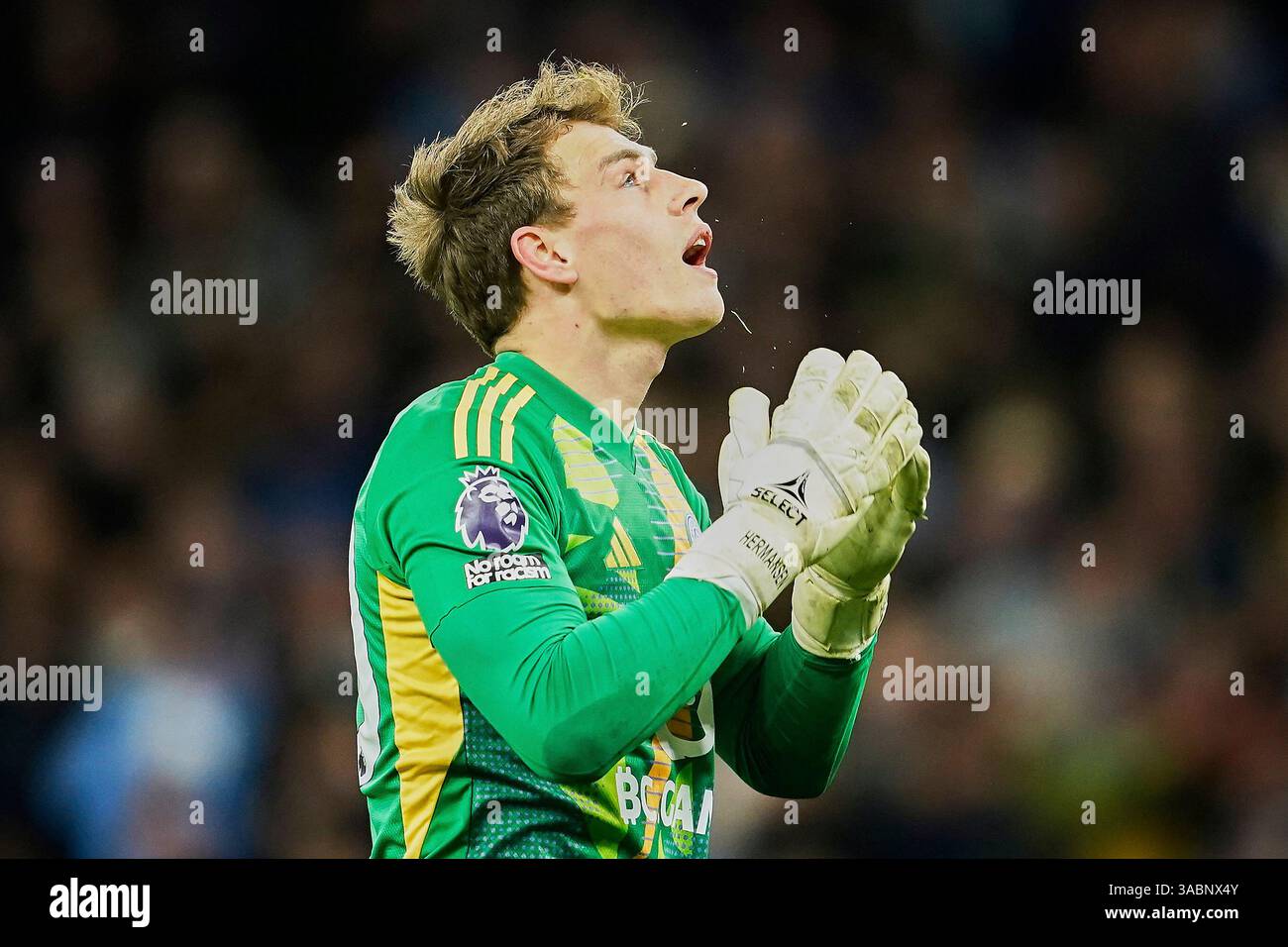 Leicester's goalkeeper Mads Hermansen reacts after receiving a second ...
