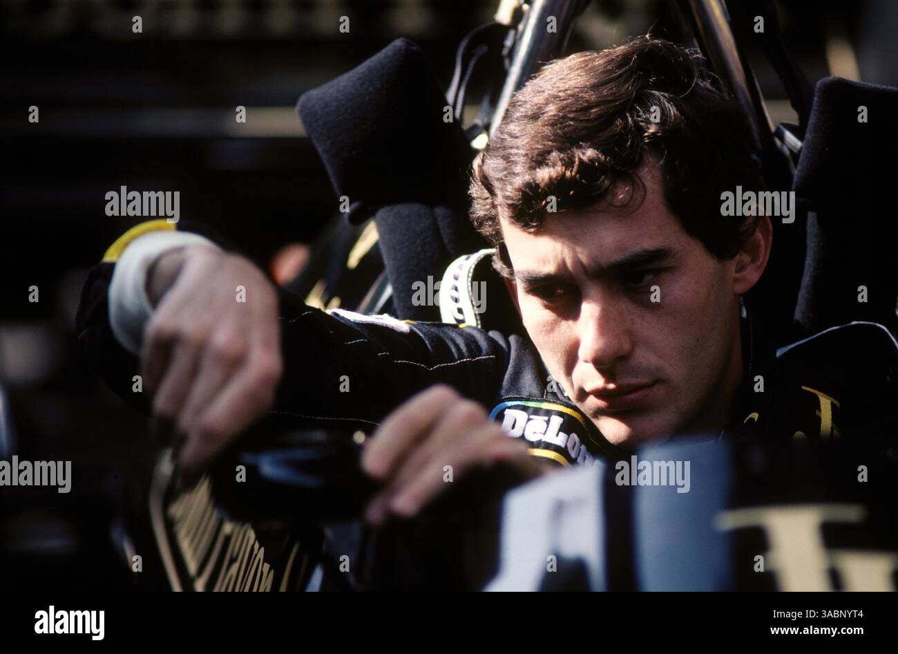 Ayrton Senna (BRA) Lotus 98T adjusts his wing mirror..1986 Formula One ...
