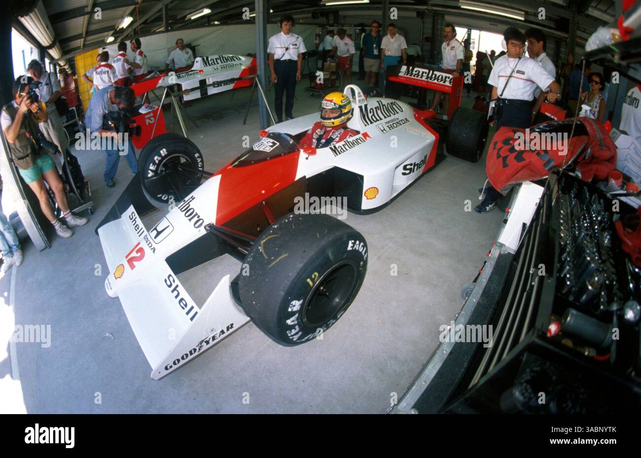 Race winner Ayrton Senna (BRA) McLaren MP4/4 beat his team mate Alain ...