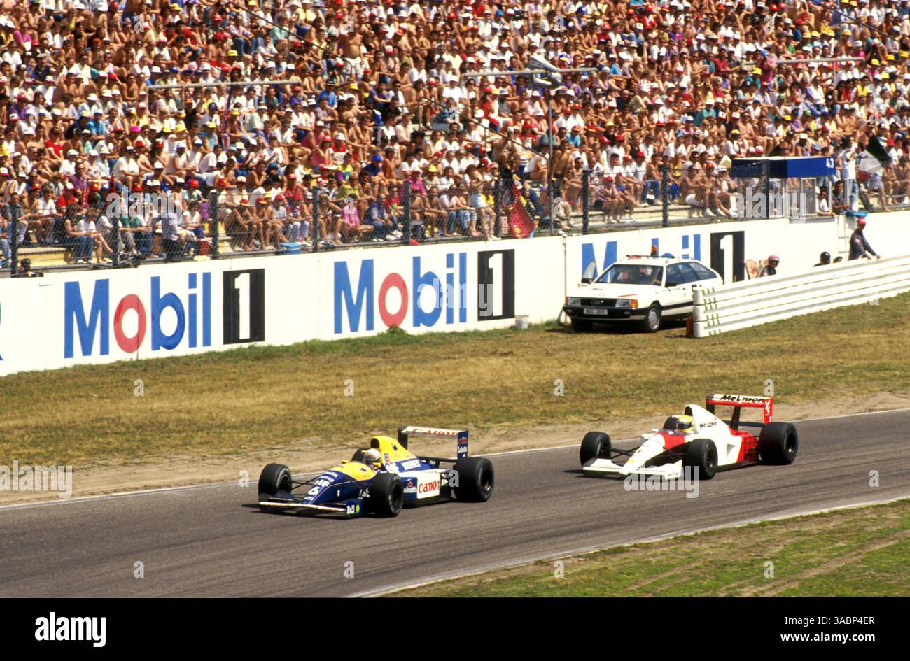 Riccardo Patrese (ITA) Williams Renault FW14 leads Ayrton Senna (BRA ...