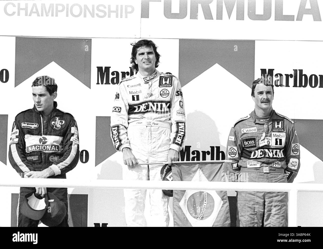 The podium (L to R): Ayrton Senna (BRA) Williams second, Nelson Piquet ...