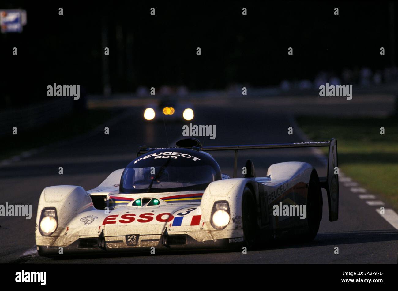Race winners Eric Helery (FRA) / Christophe Bouchut (FRA) / Geoff Brabham (AUS) Peugeot 905 Evo ...