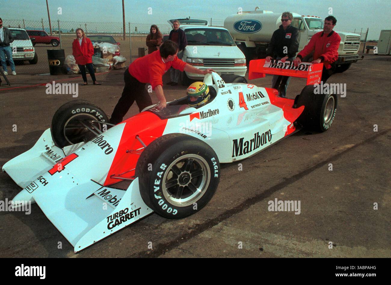 Ayrton Senna (BRA) is pushed out of the paddock and towards the test ...
