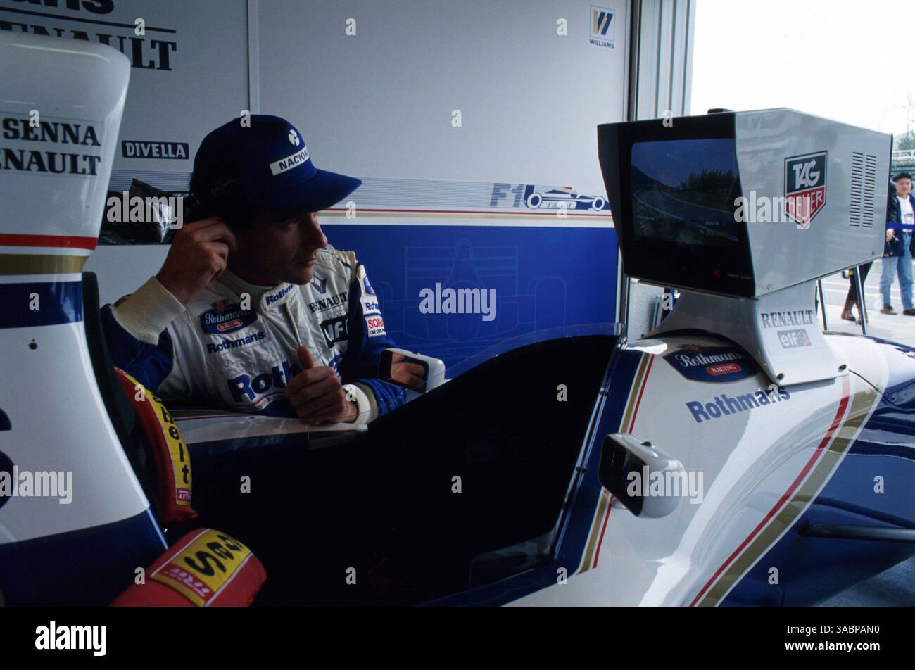 Pole sitter Ayrton Senna (BRA) Williams watches the others trying to ...