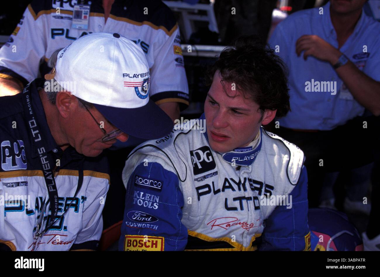 Jacques Villeneuve (CDN) with Players team members in the paddock..PPG ...