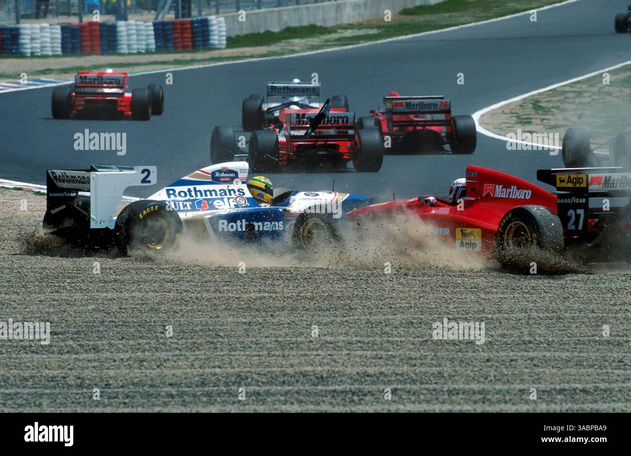 Nicola Larini (ITA) (right) Ferrari 412T1 takes off Ayrton Senna (BRA ...