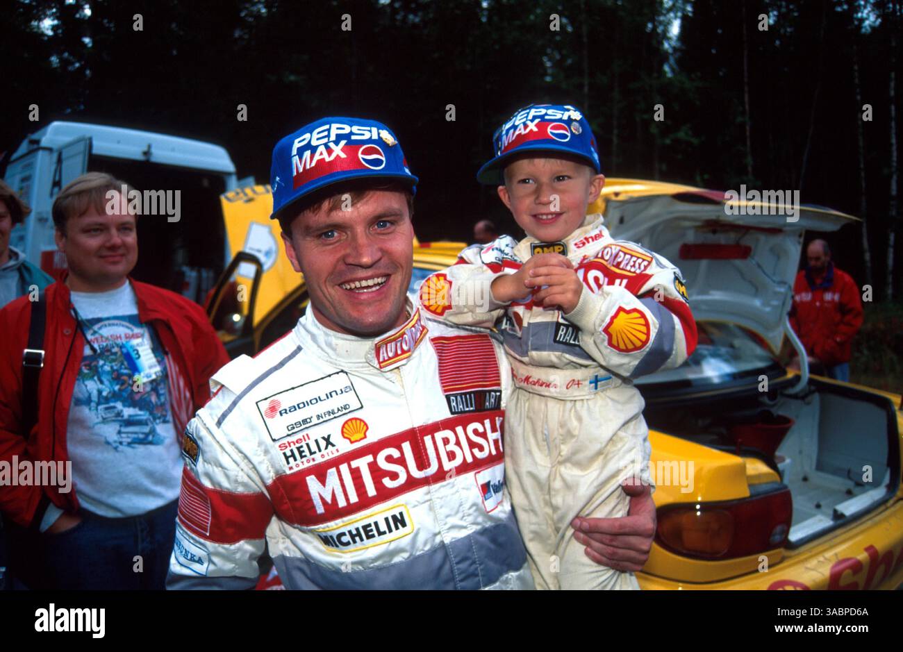 Tommi Makinen (FIN) Mitsubishi with son...FIA 2 Litre World rally Championship, 1000 Lakes Rally ...