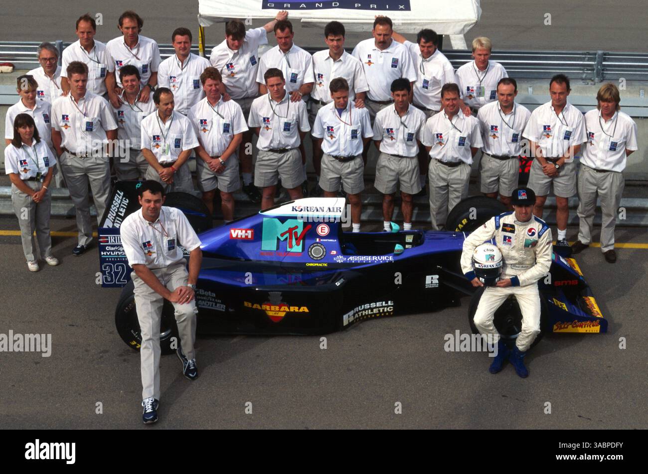 An end of season team photograph for the Simtek team, with Nick Wirth ...