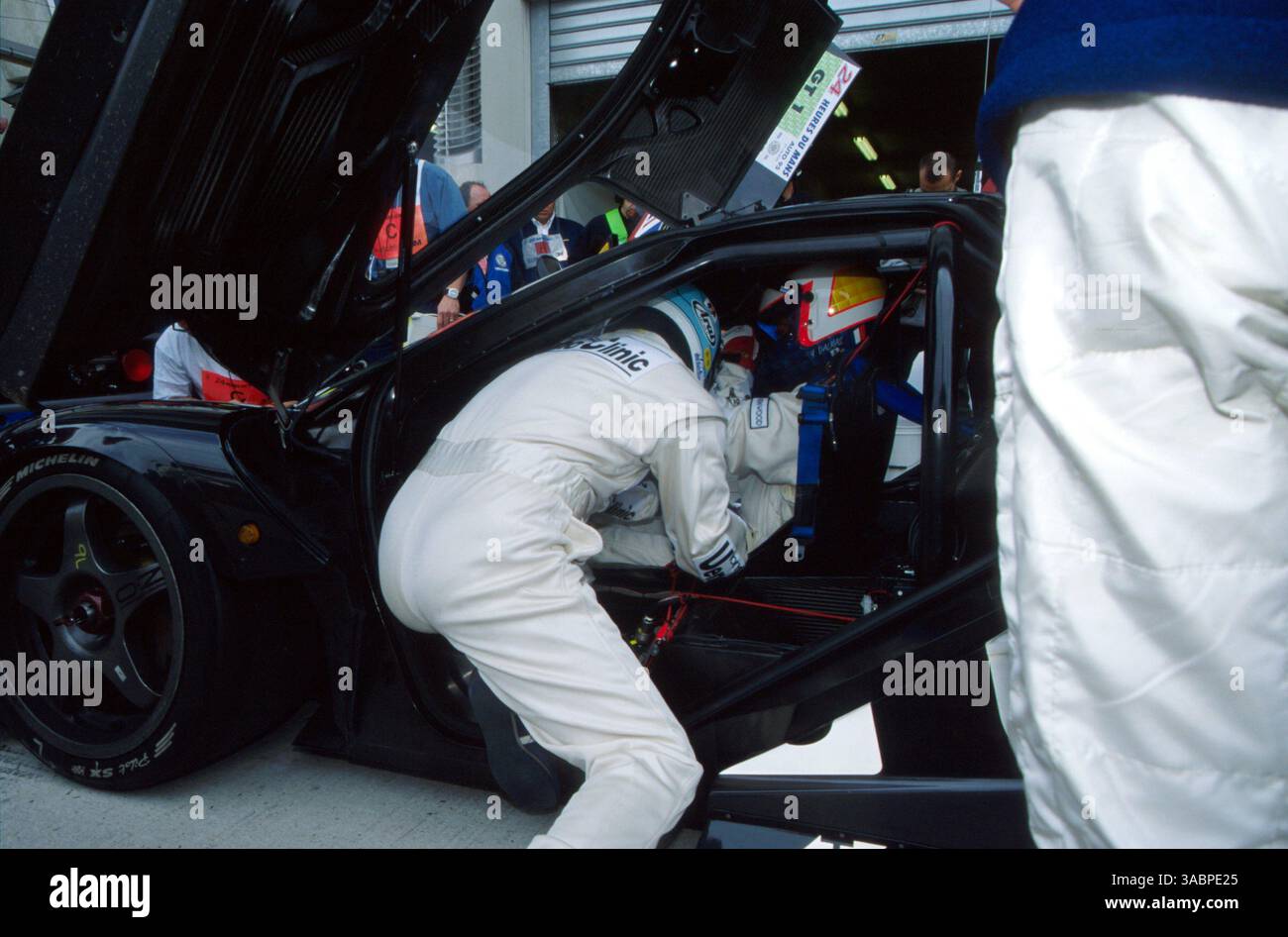 Masanori Sekiya (JPN) hands over the Kokusai Kaihatsu Racing McLaren F1 ...