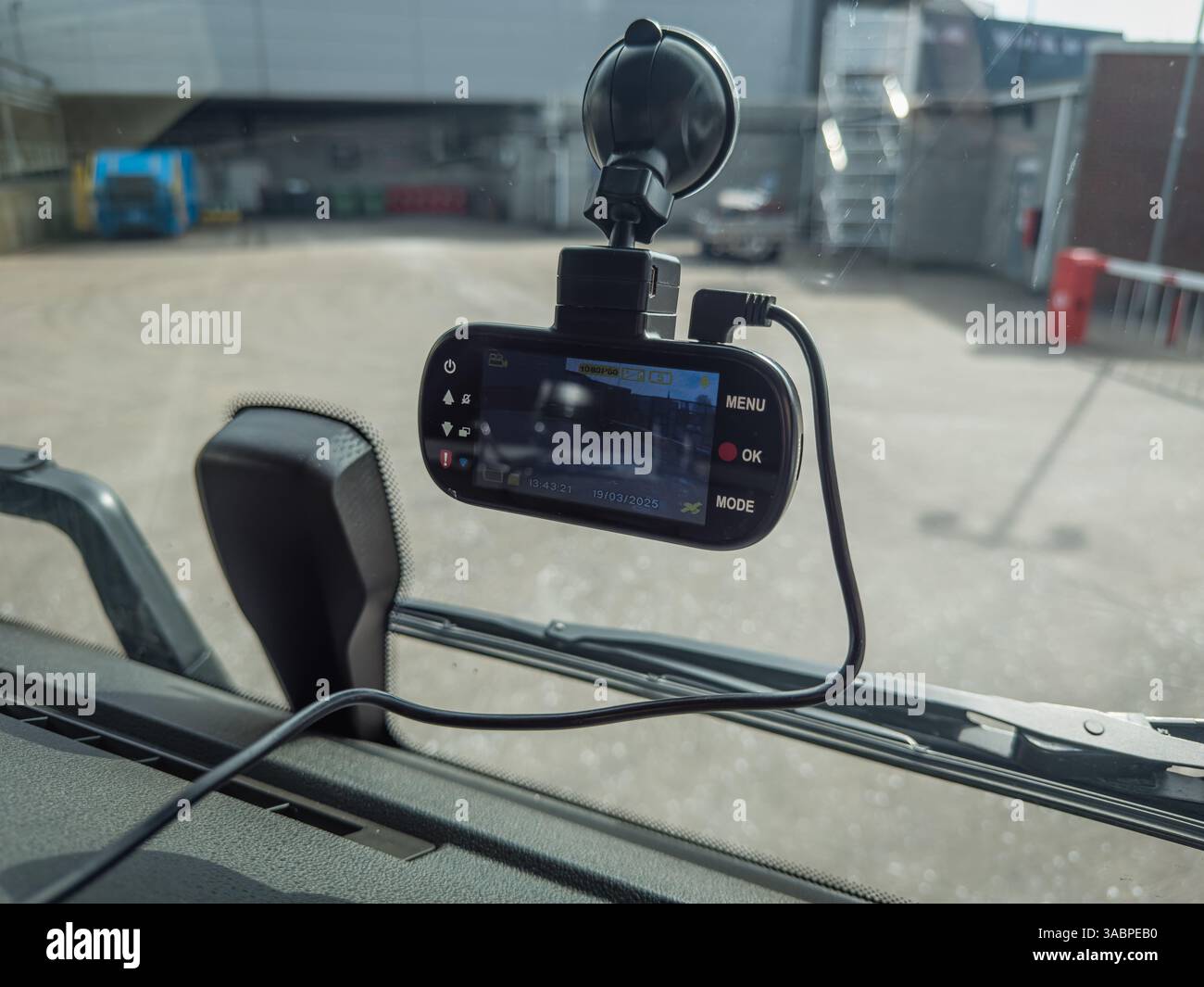 A high-tech dashboard camera mounted in an HGV (lorry/truck), recording ...