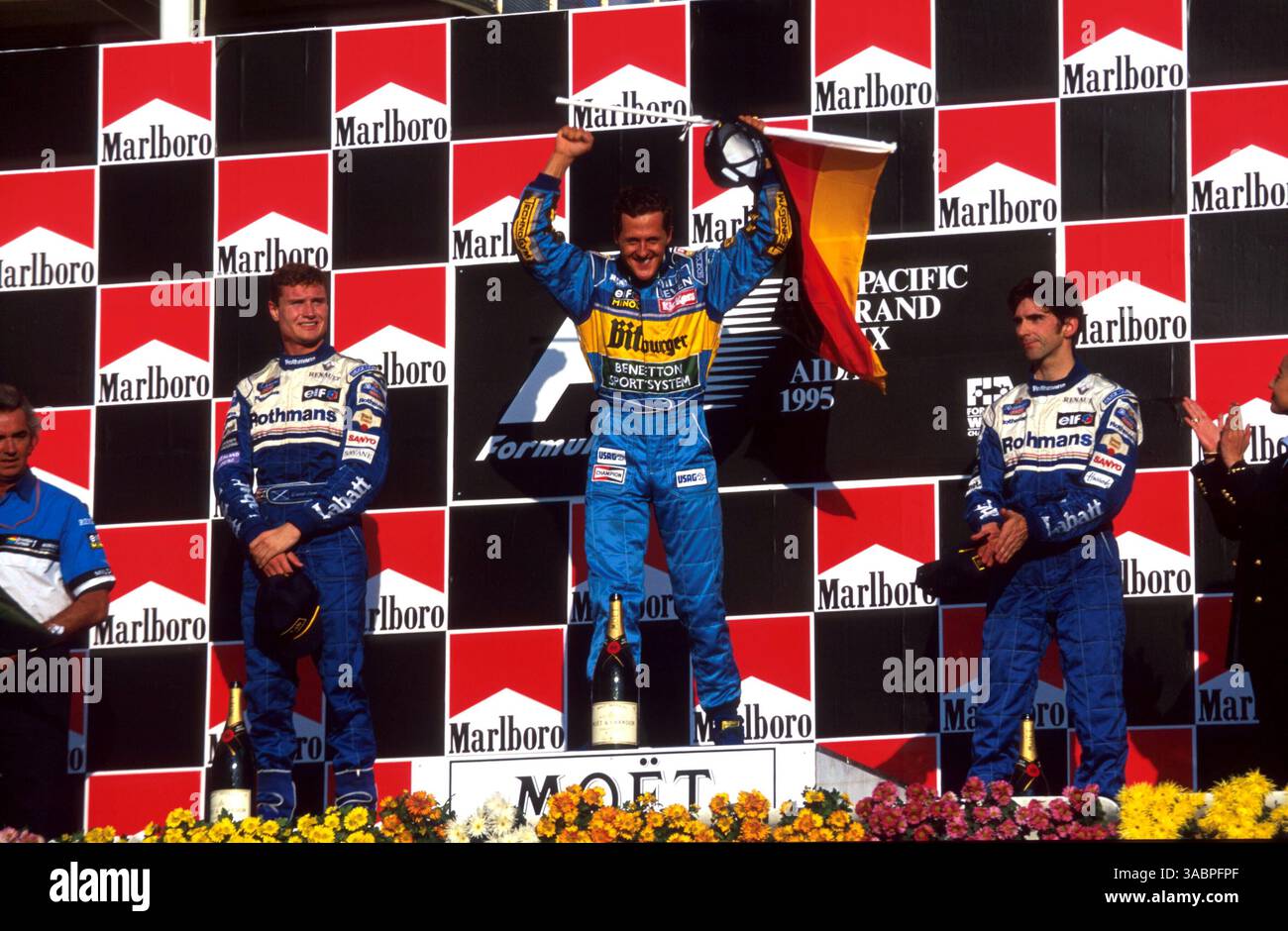 David Coulthard left and Damon Hill right, don't look as pleased as ...