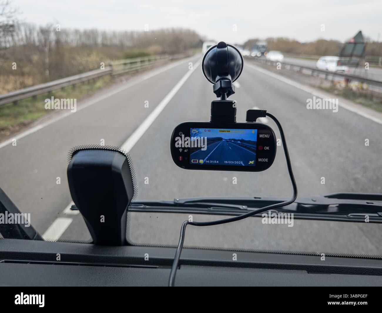 A high-tech dashboard camera mounted in an HGV (lorry/truck), recording ...