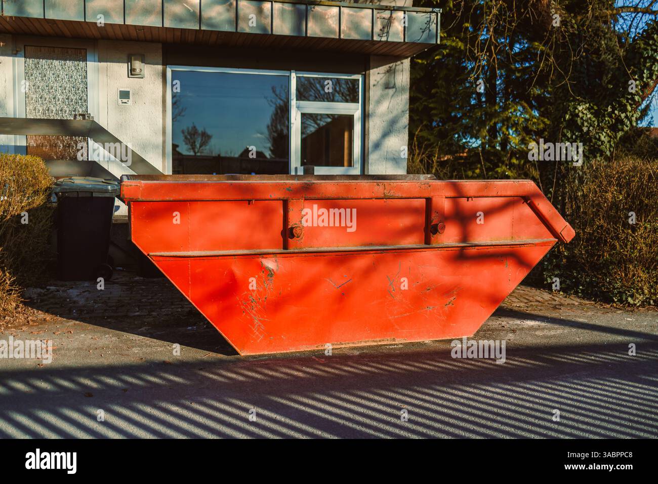 Large metal container for construction waste. Container stands near the ...