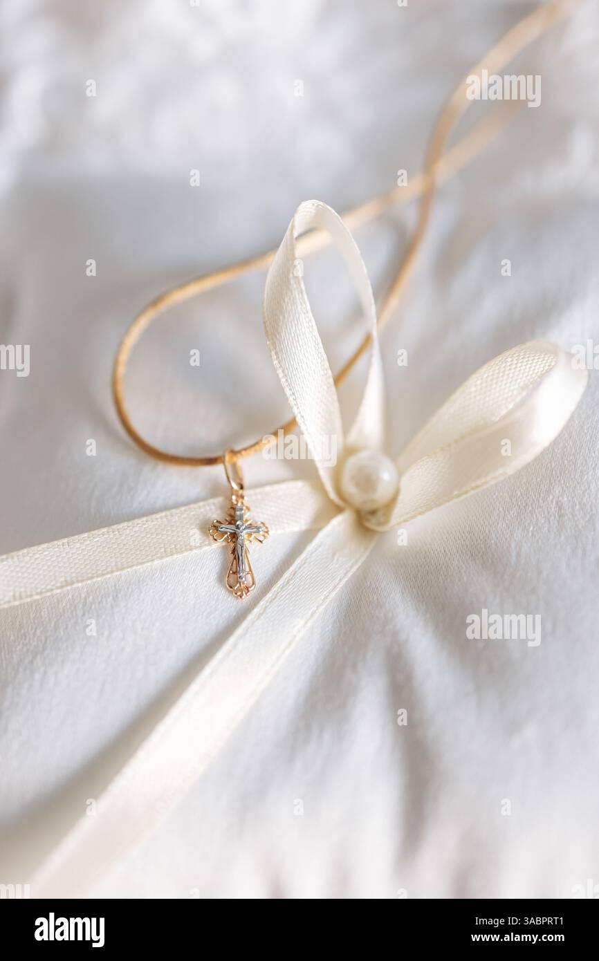 This stunning gold cross necklace features intricate details that ...