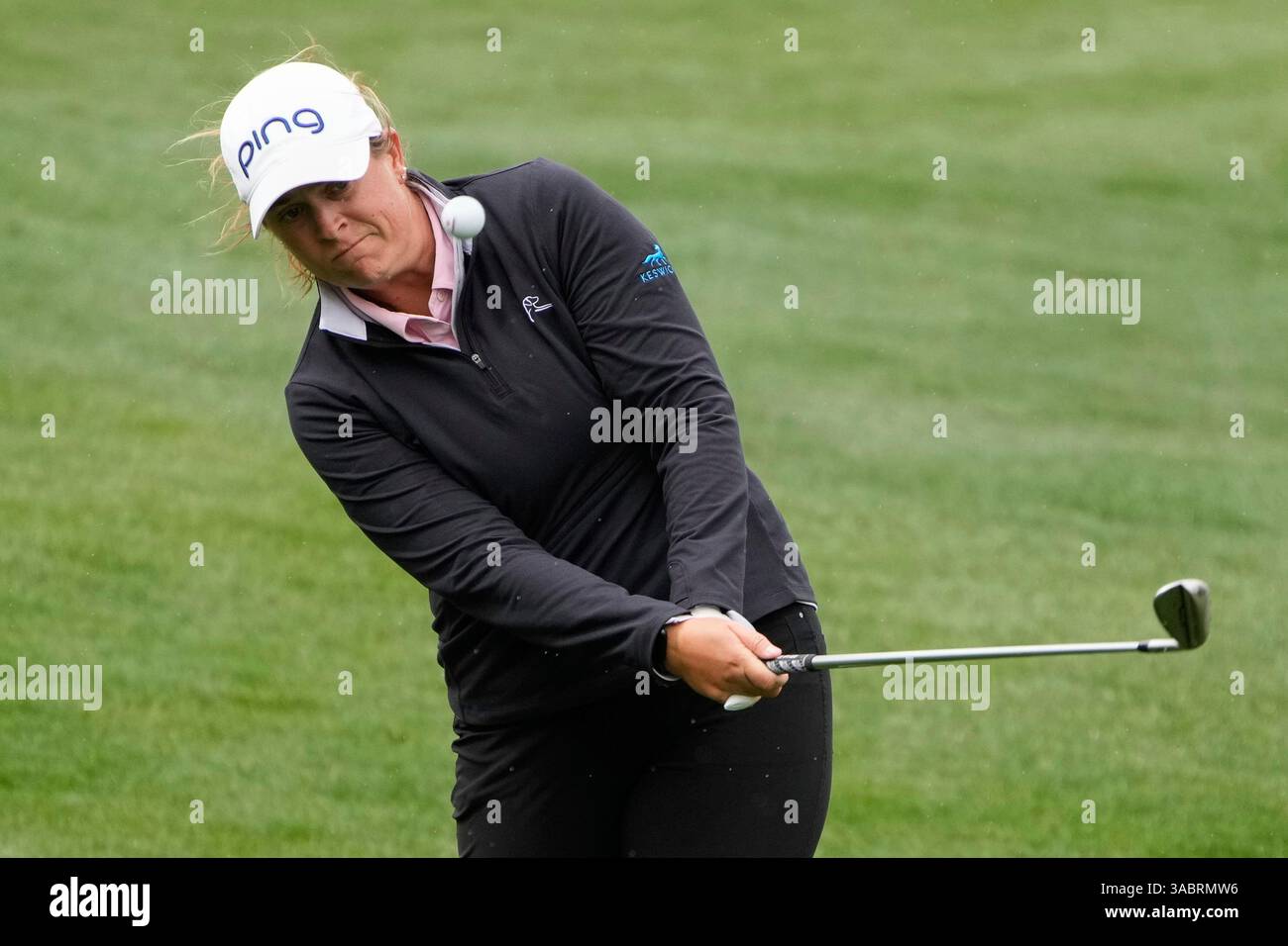 Lauren Coughlin chips onto the fourth green during the first round of the LPGA T-Mobile Match ...