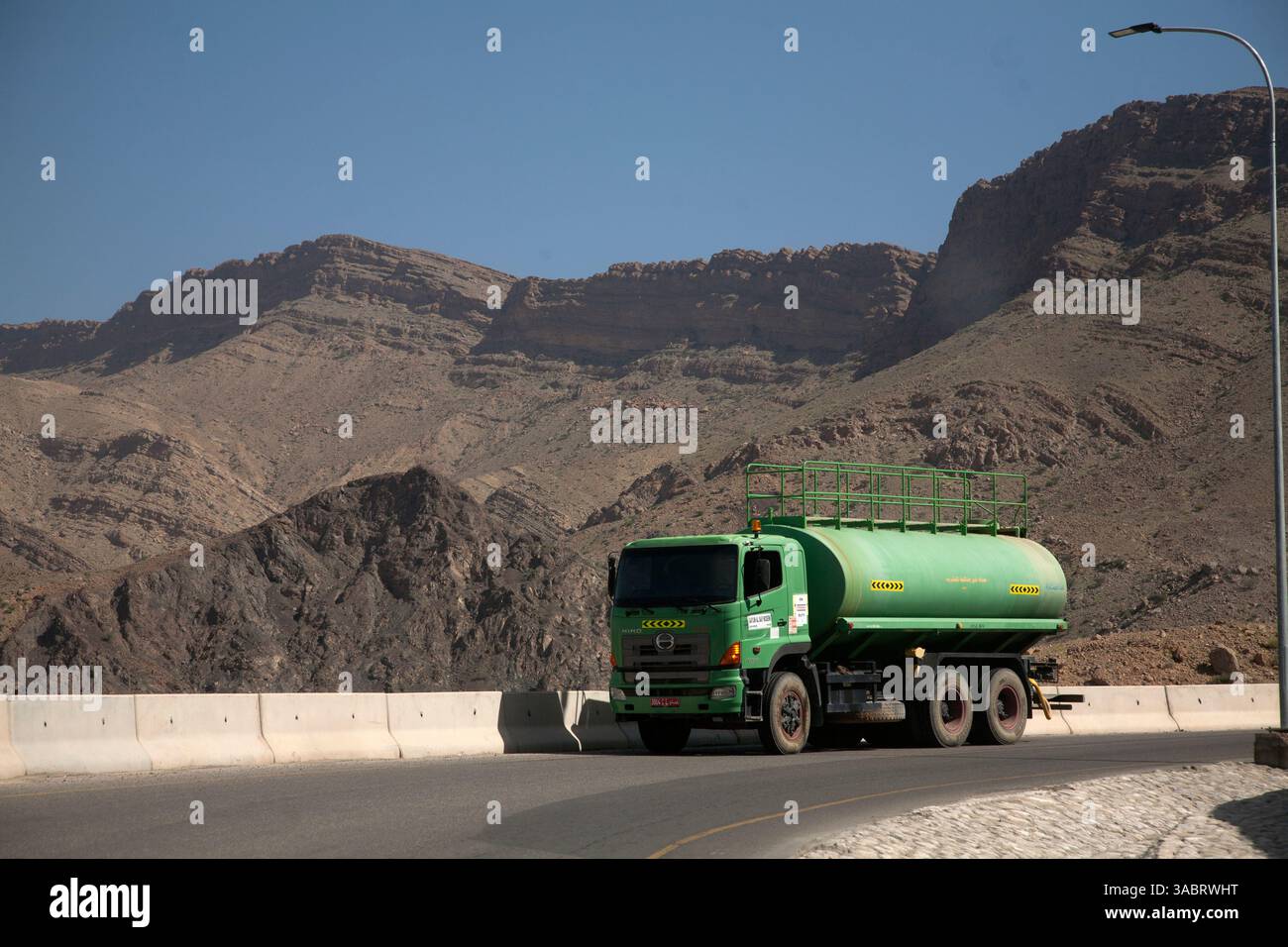 water tanker lorry climbing through eastern hajar mountains oman ...