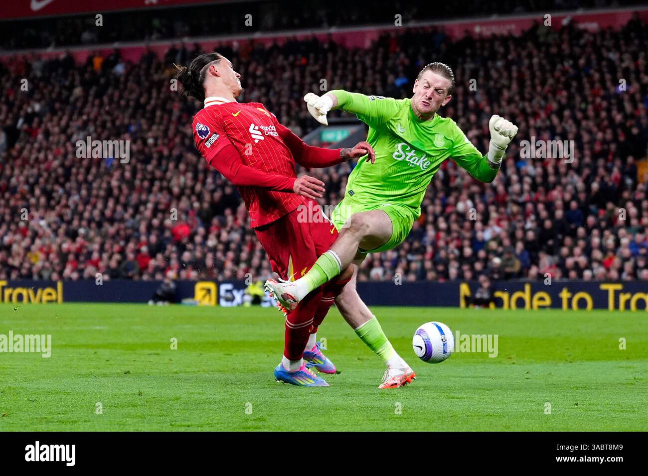 Liverpool's Darwin Nunez (left) and Everton goalkeeper Jordan Pickford ...