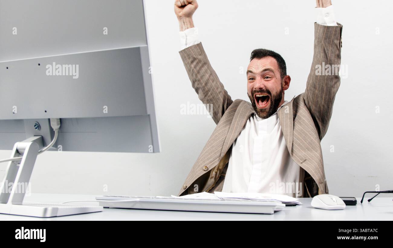 A happy businessman receives an incredible opportunity, news or reward ...