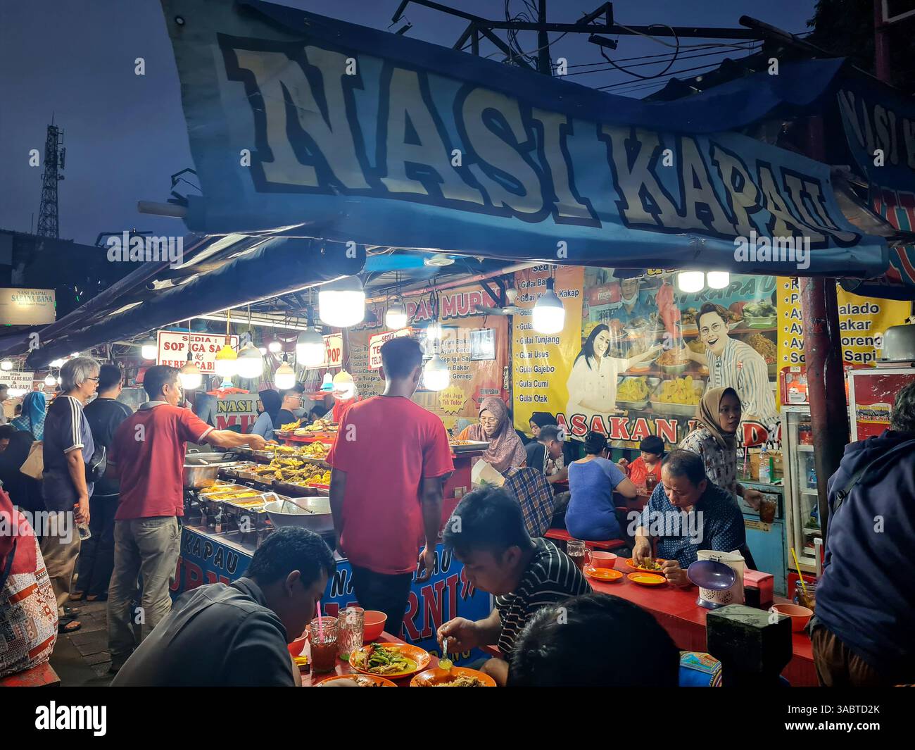 Scene at a Nasi Padang or Nasi Kapau street food restaurant in Jakarta ...