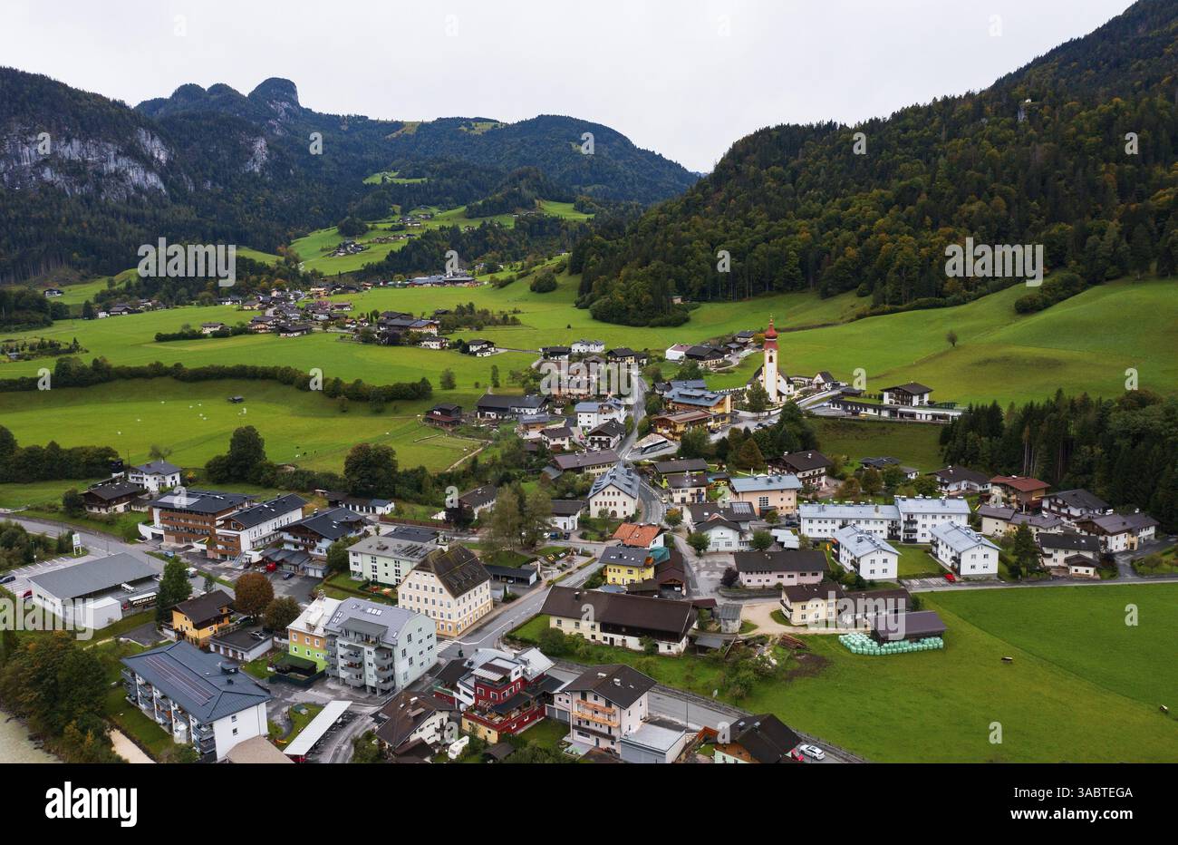Drone image, residential buildings, view of village with parish church ...