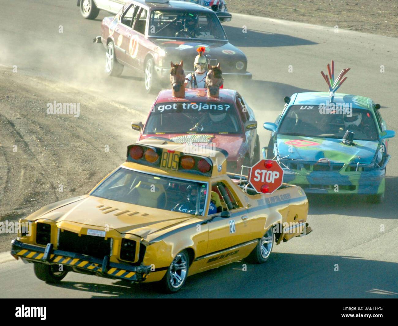 Team Short Bus rounds a corner during the 24 Hours of LeMons endurance ...