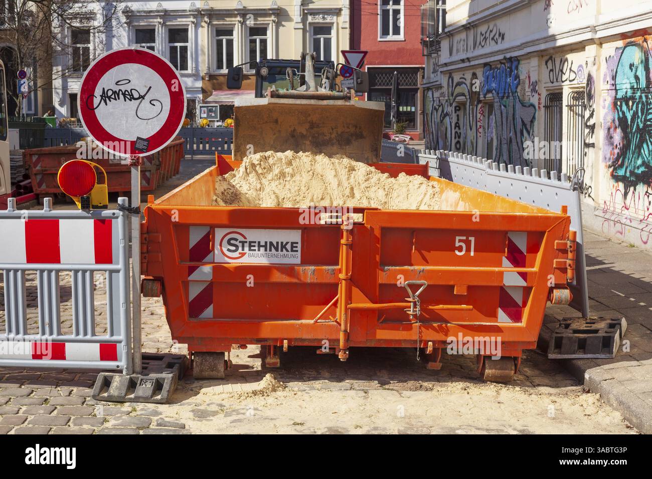 Container, waste container, skip filled with sand on a construction ...