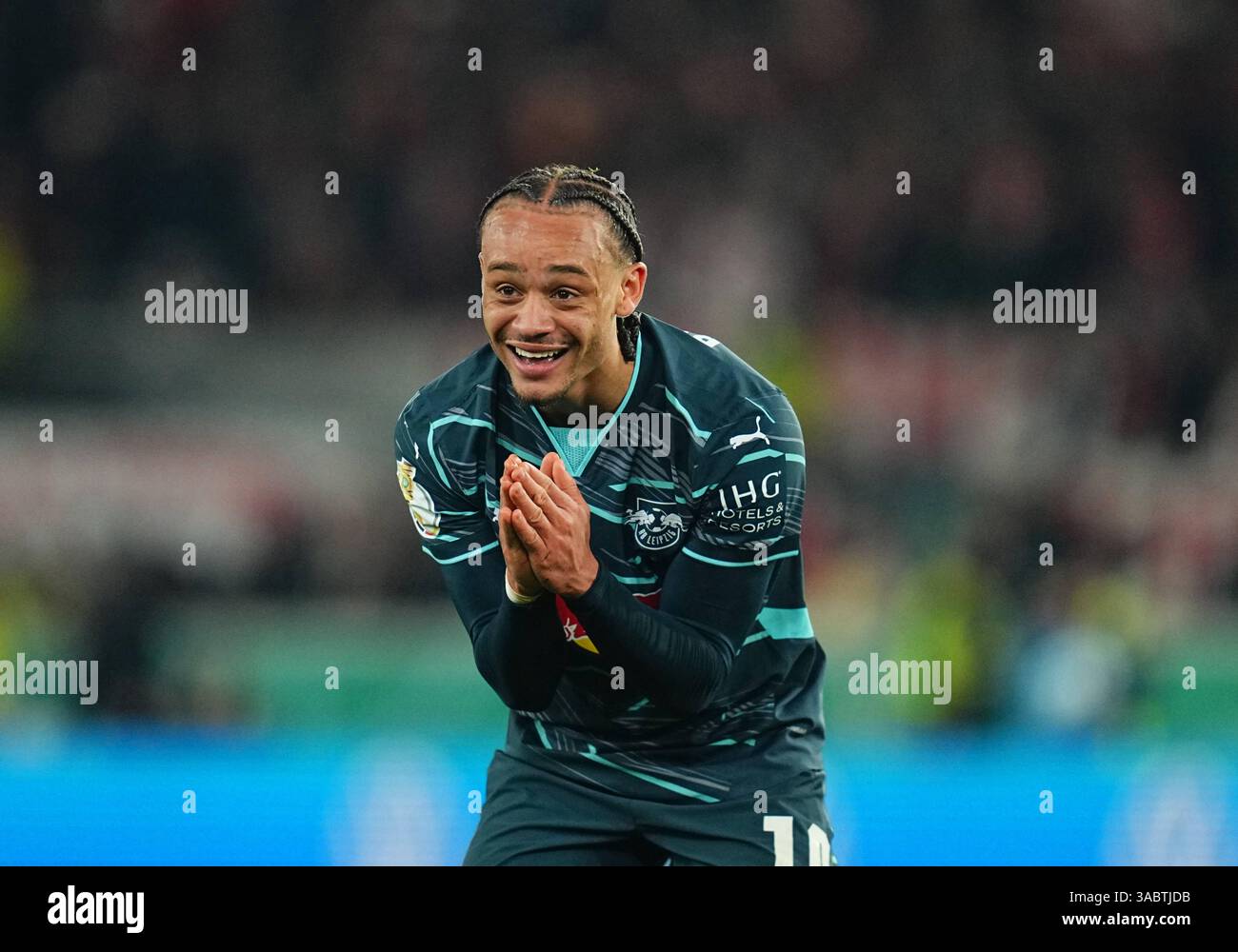 MHP Arena, Stuttgart, Germany. 02nd Apr, 2025. Xavi Simons of RB Leipzig gestures during a DFB ...