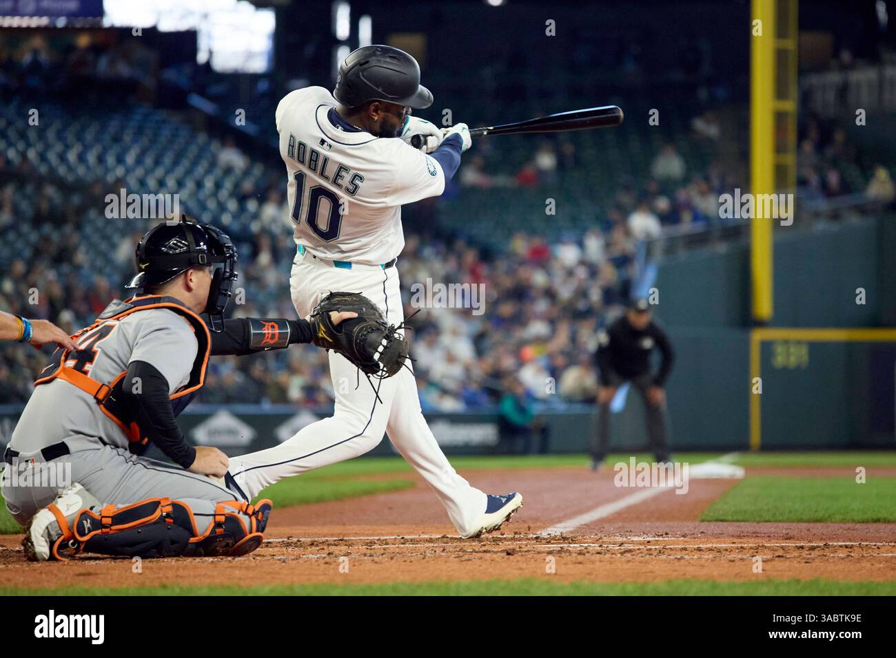 Seattle Mariner'r Victor Robles hits a two-RBI double against the Detroit Tigers during the ...