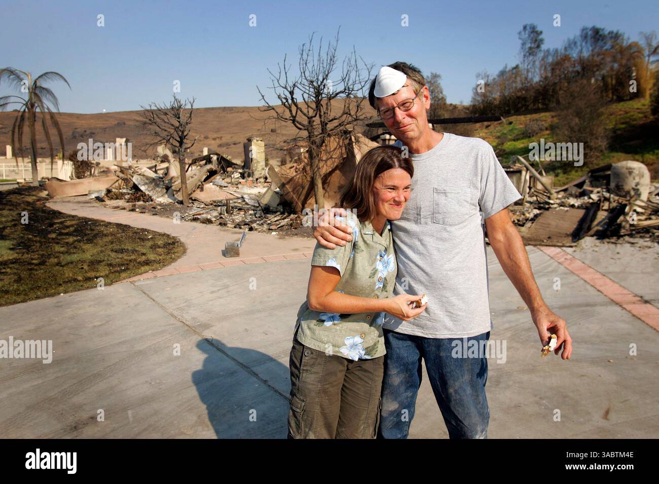 Oct 24, 2007 - San Diego, CA, USA - ANN and JEFF OWENS eat a piece of ...