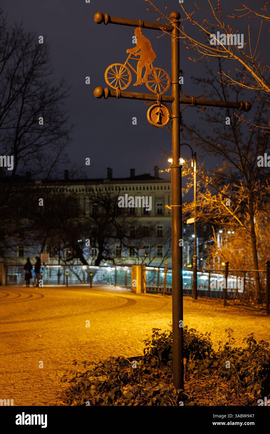 Bicycle symbol on a vintage style metal cut out bicycle path sign ...