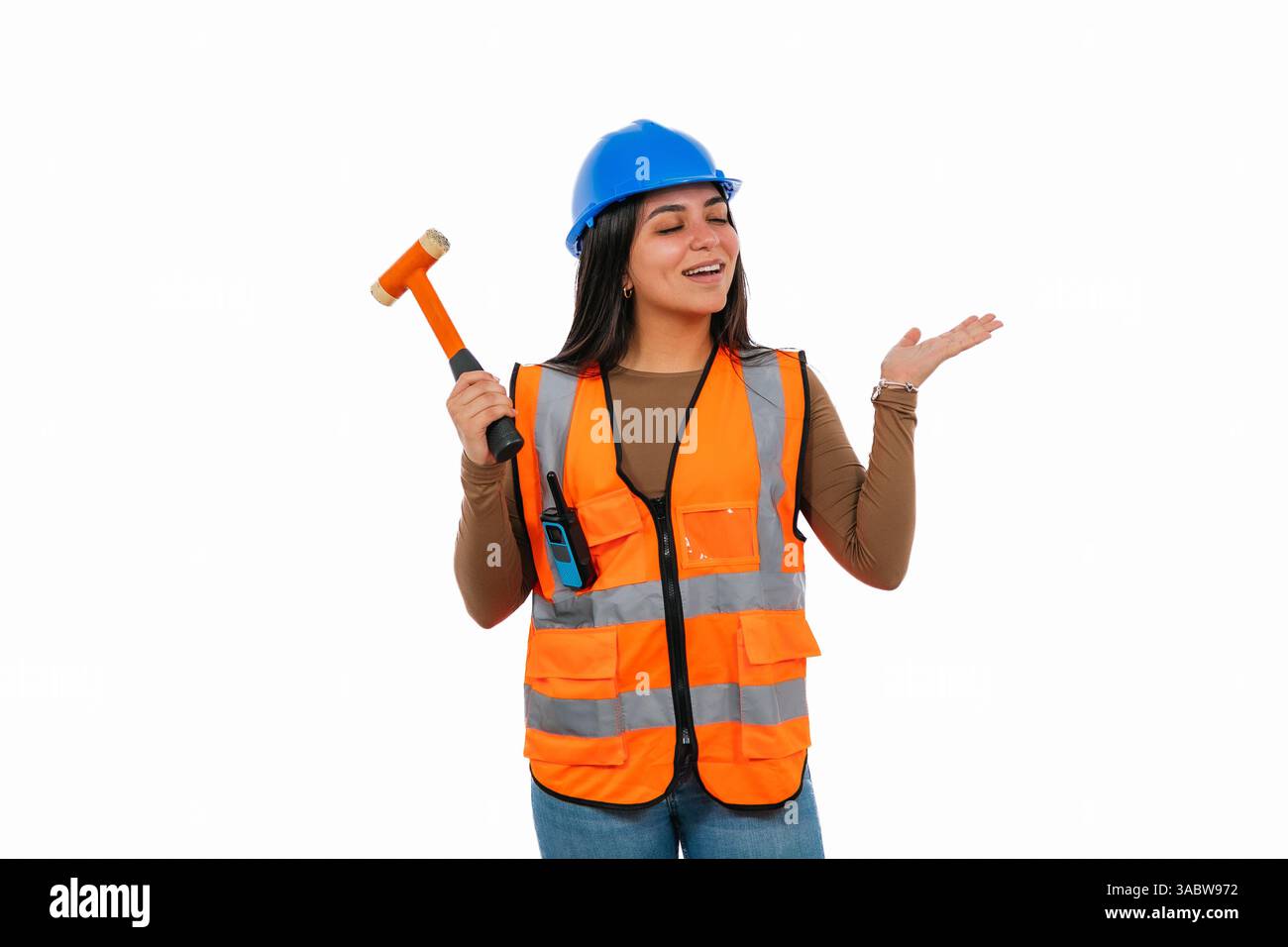 Young smiling Latin woman working as a construction worker, wearing a ...