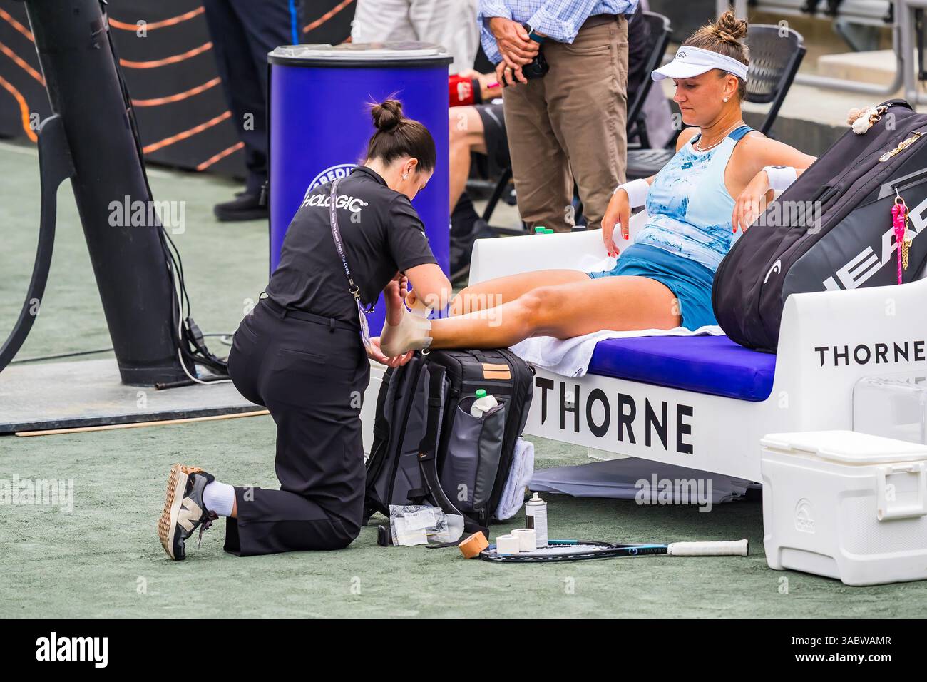 Daniel Island, Sc, USA. 2nd Apr, 2025. IRYNA SHMANOVICH (Q) (RUS) takes a medical timeout to ...