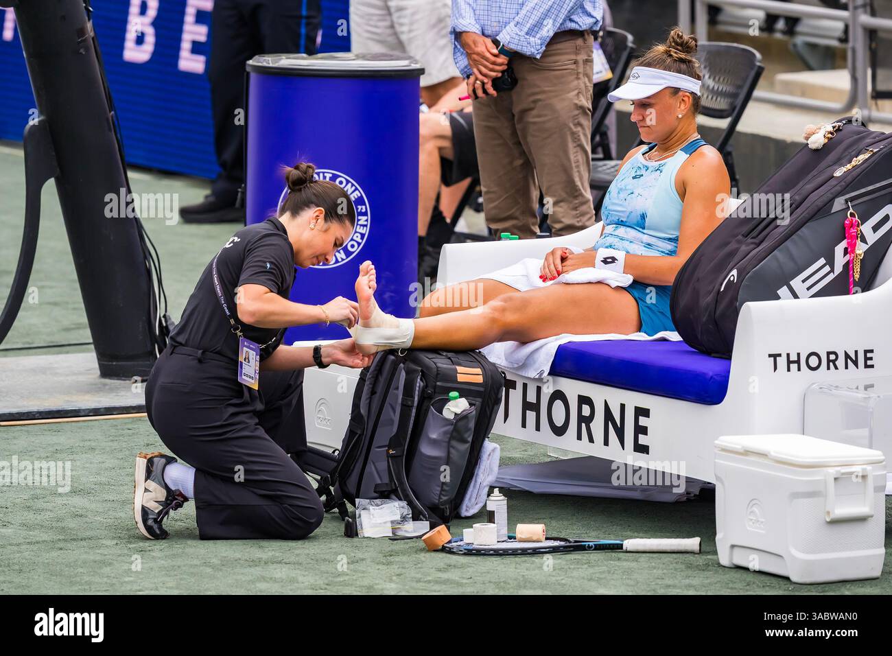 Daniel Island, Sc, USA. 2nd Apr, 2025. IRYNA SHMANOVICH (Q) (RUS) takes a medical timeout to ...