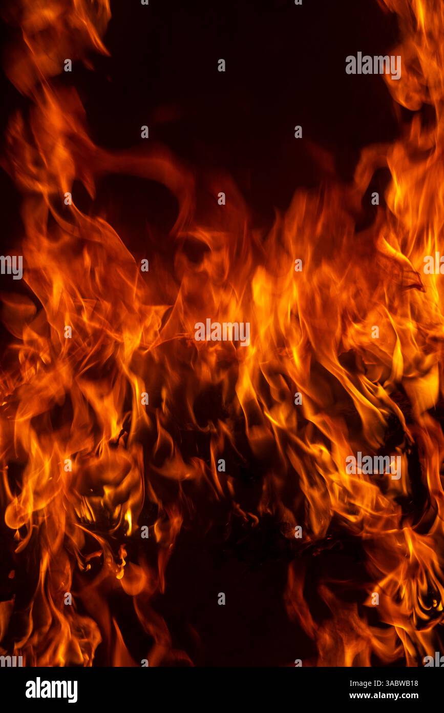 Fire flame background. Hell bonfire. Texture of fire on a black ...